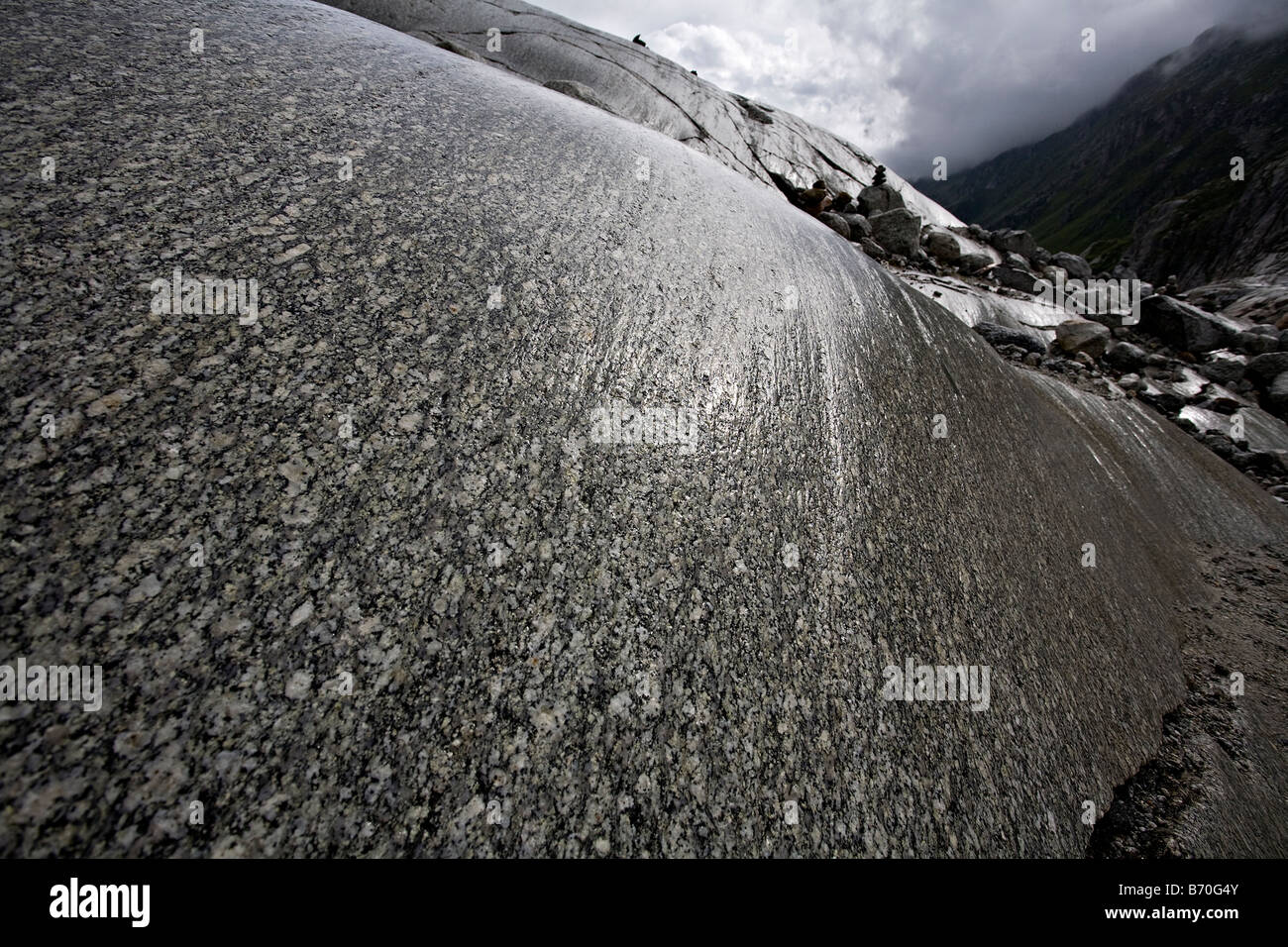 Granite boulder polished by glacial abrasion, Rhonegletscher, Swiss ...