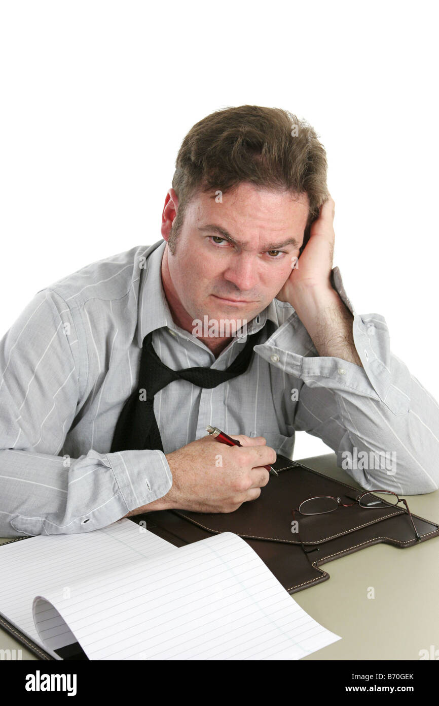 A tired unhappy looking office worker after a hard day Stock Photo - Alamy