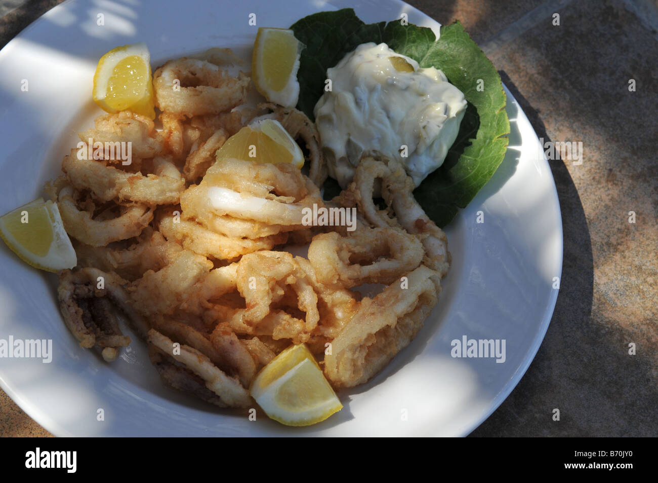 Fried squid greece hi-res stock photography and images - Alamy