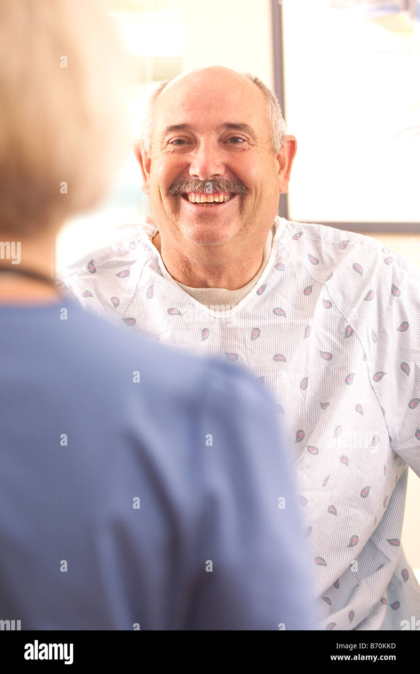 male patient with nurse Stock Photo - Alamy