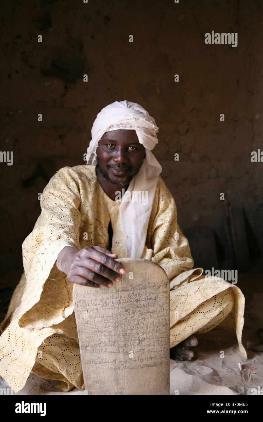 The marabout in his house in Timbuctu Wooden boards around him are ...