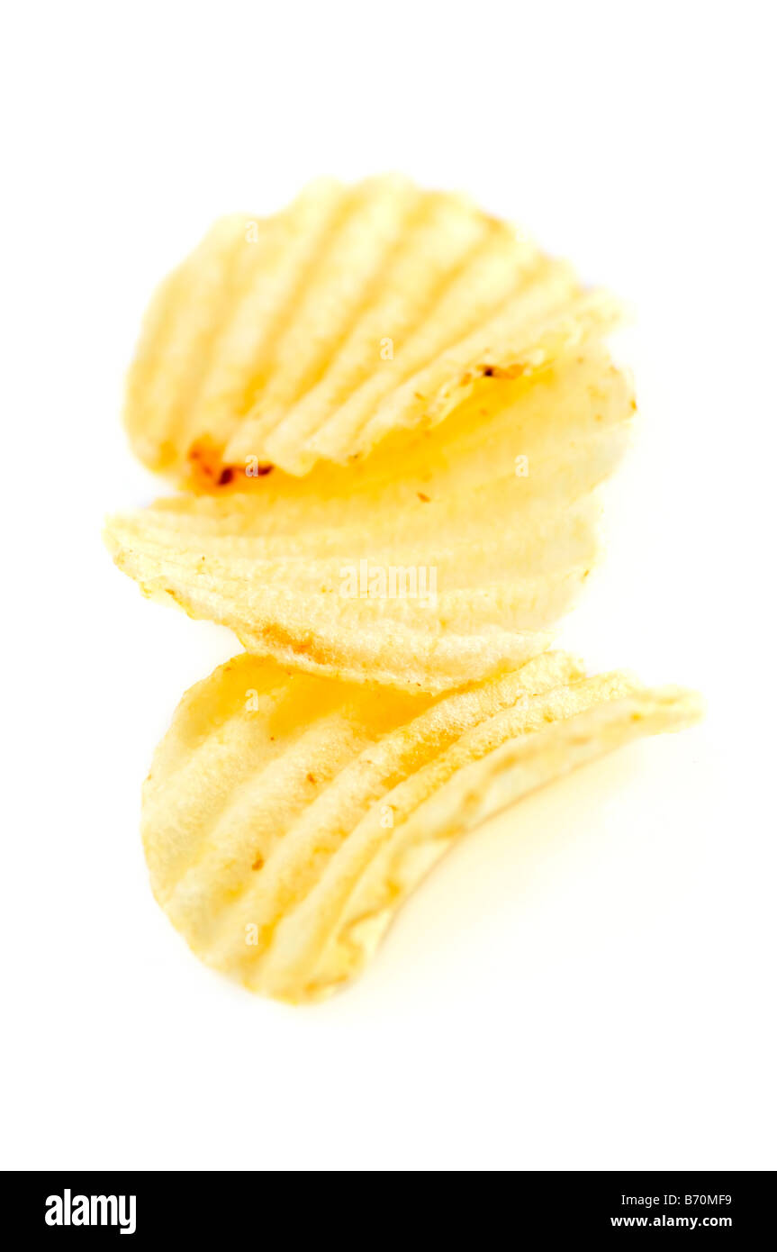 Several potato chips isolated on white background Stock Photo - Alamy