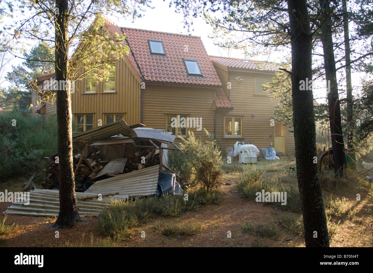 Houses in the woods Findhorn Foundation Community Stock Photo - Alamy