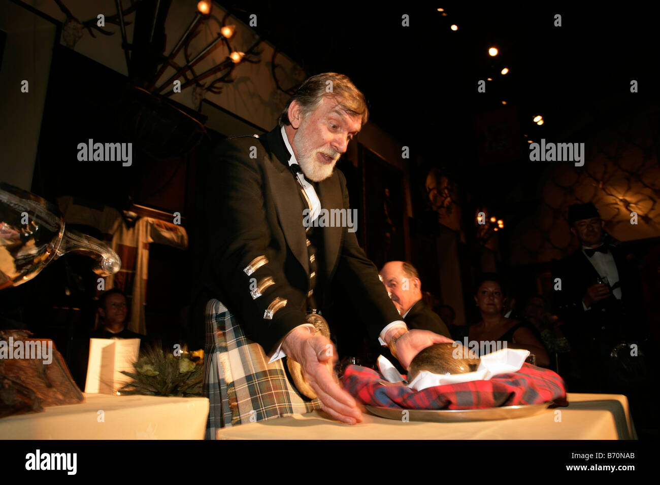 Addressing the haggis at a traditional Burns Night Supper Stock Photo ...