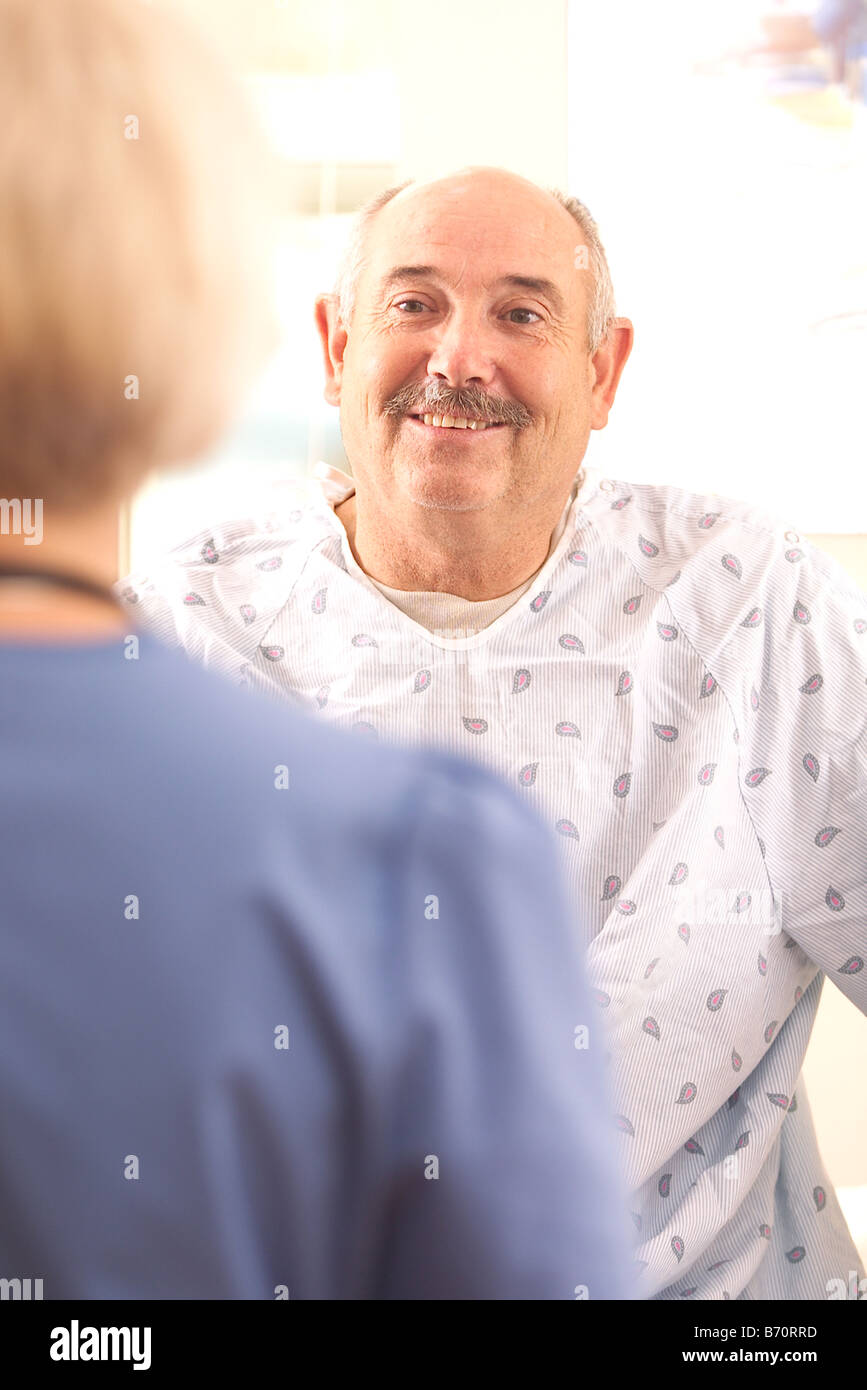 male patient with nurse Stock Photo - Alamy