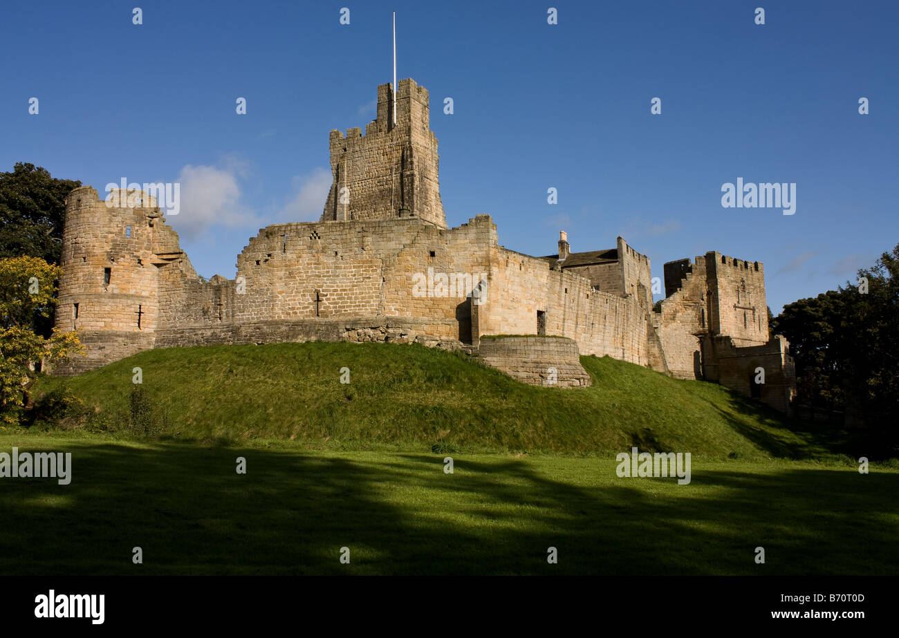 Overall view of Prudhoe Castle from south side in front of mill pond ...