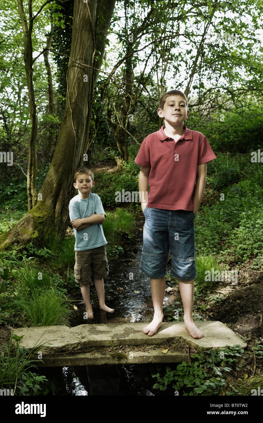 Boys standing outside hi-res stock photography and images - Alamy