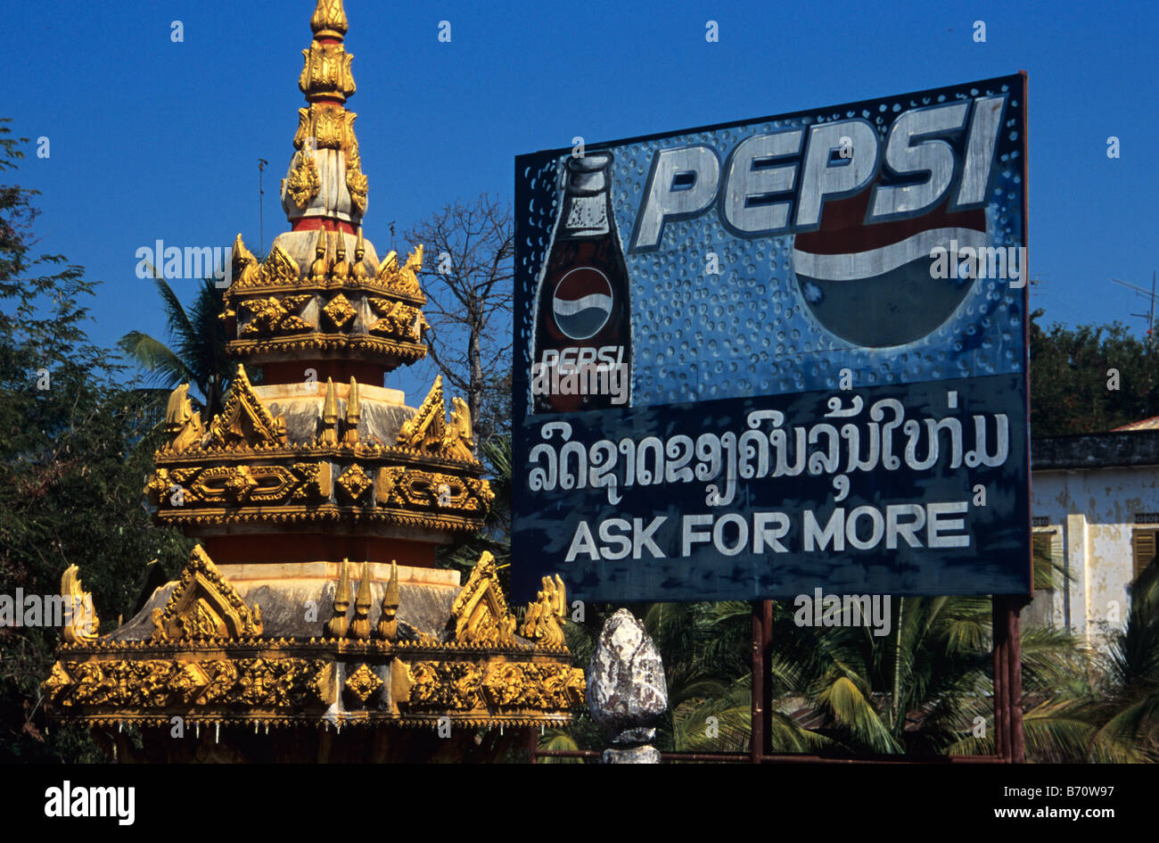 Pepsi Cola Advertisement Sign or Hoarding and Buddhist Stupa, Pakse ...
