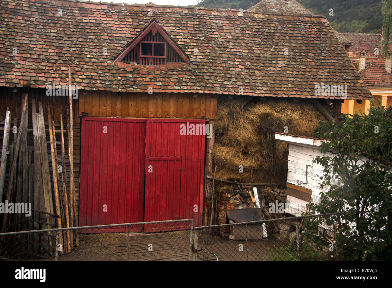 Barn filled with hay, Transylvania, Romania Stock Photo - Alamy