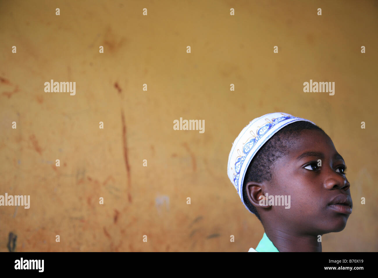 Pupil from the Islamic school in Sunyani Ghana listening to the teacher ...