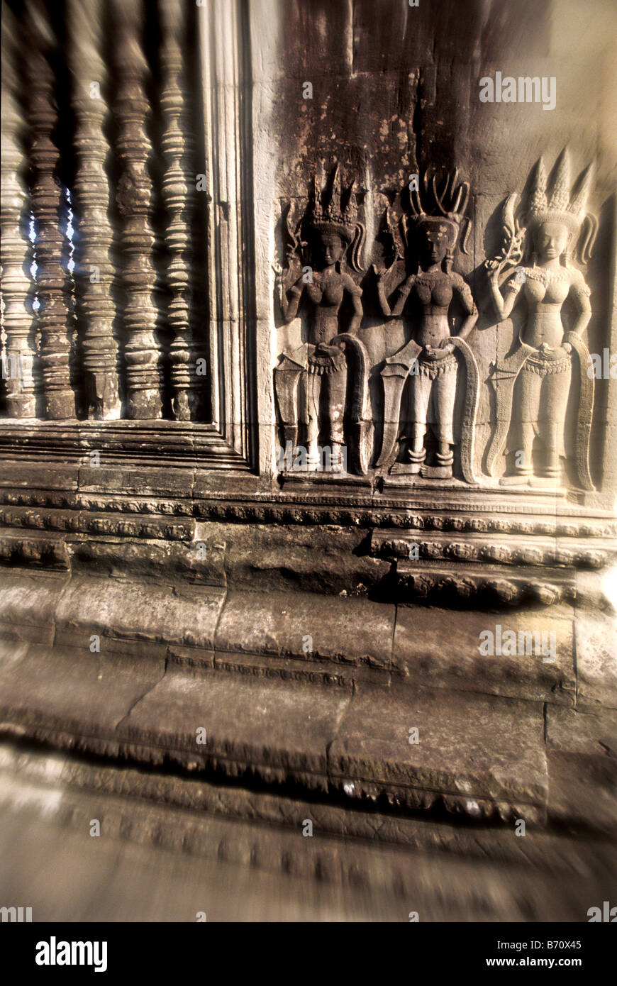 Detail of Apsara celestial dancer on exterior enclosing wall of 12th ...