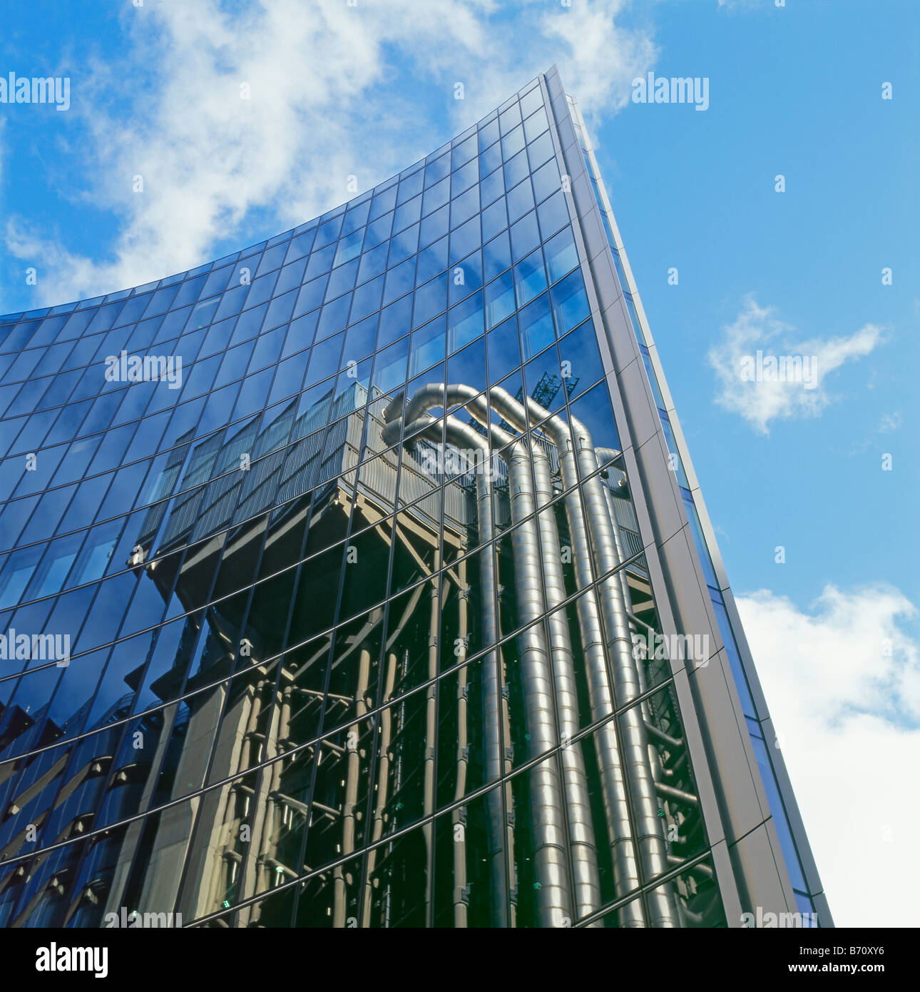 A reflection of the Lloyds building in the Willis building London ...
