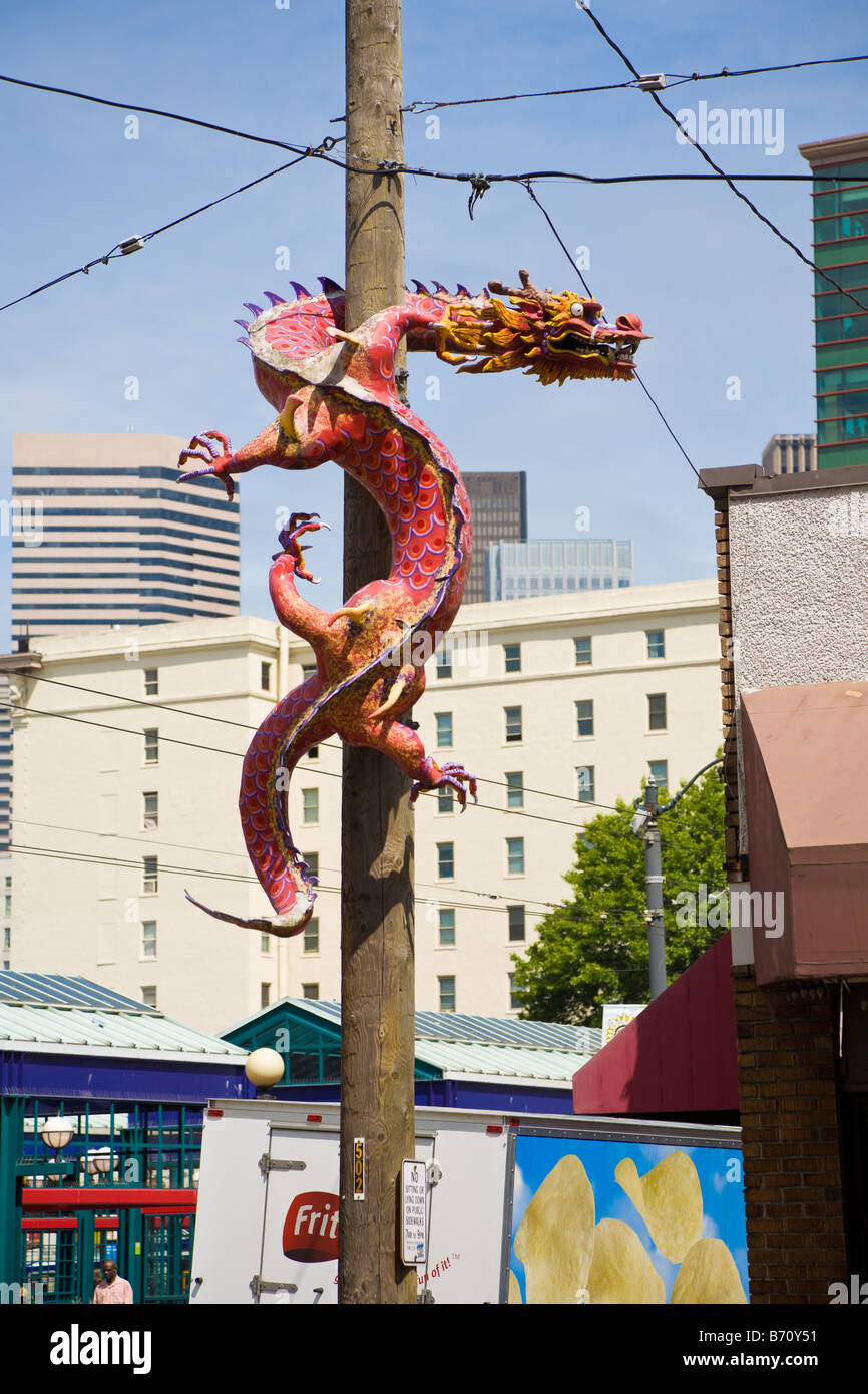 Dragon climbing utility pole in International District of Seattle ...