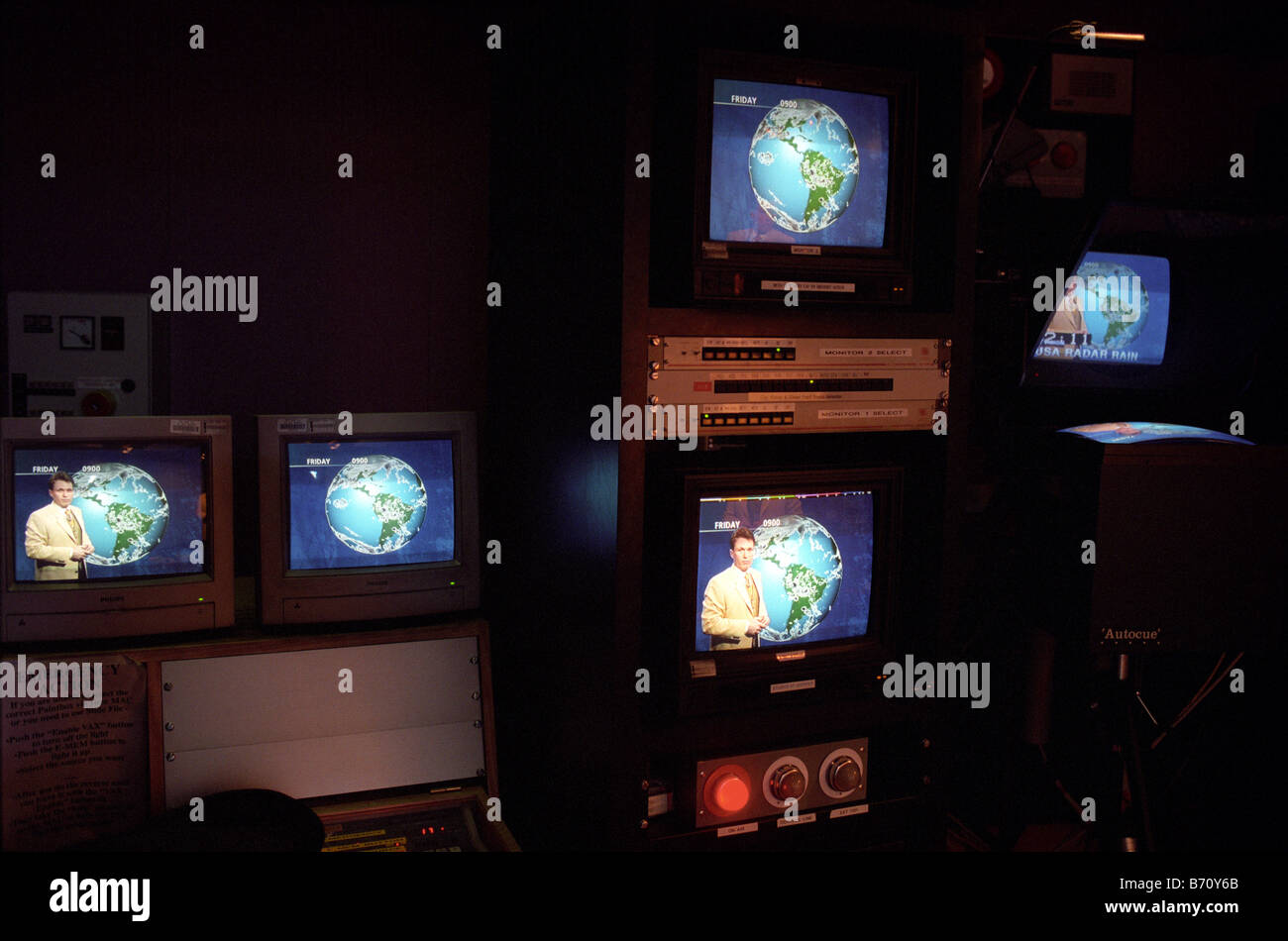 TV Weather man Richard Edgar seen on TV monitors and screens presenting ...