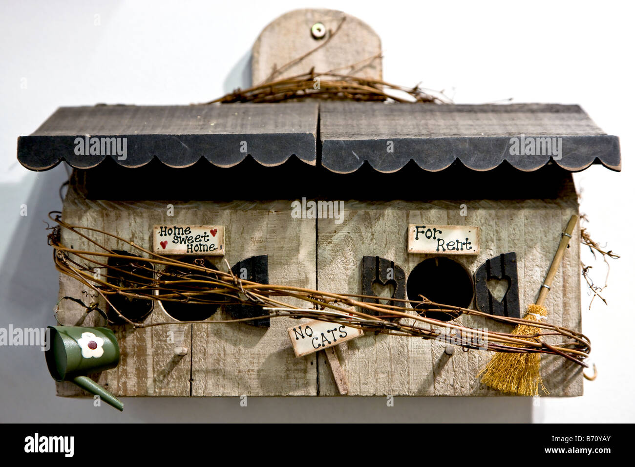 Double nesting box on the wall Stock Photo - Alamy