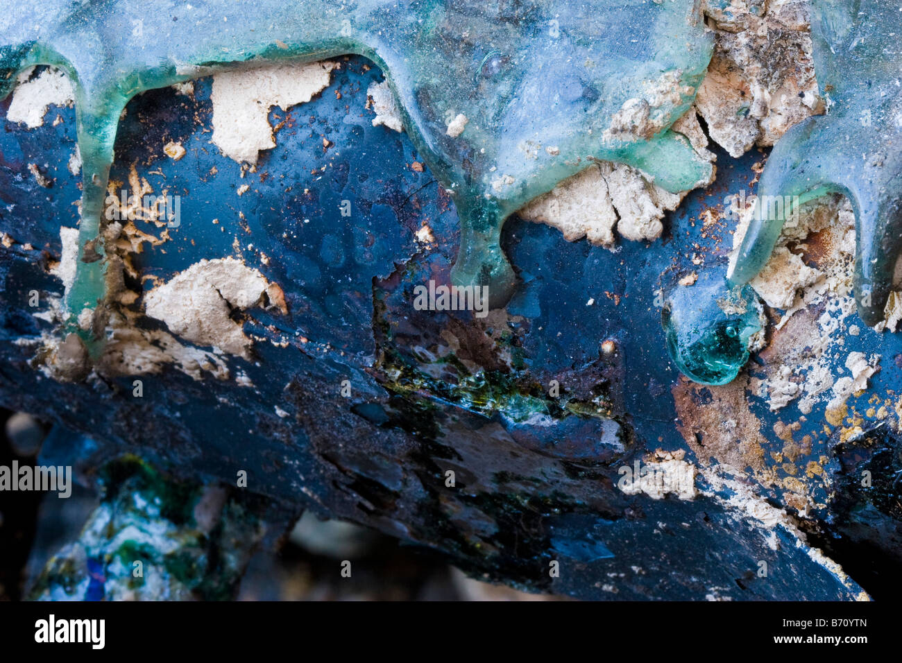 Background abstract texture of rusted metal and melted glass in shades ...
