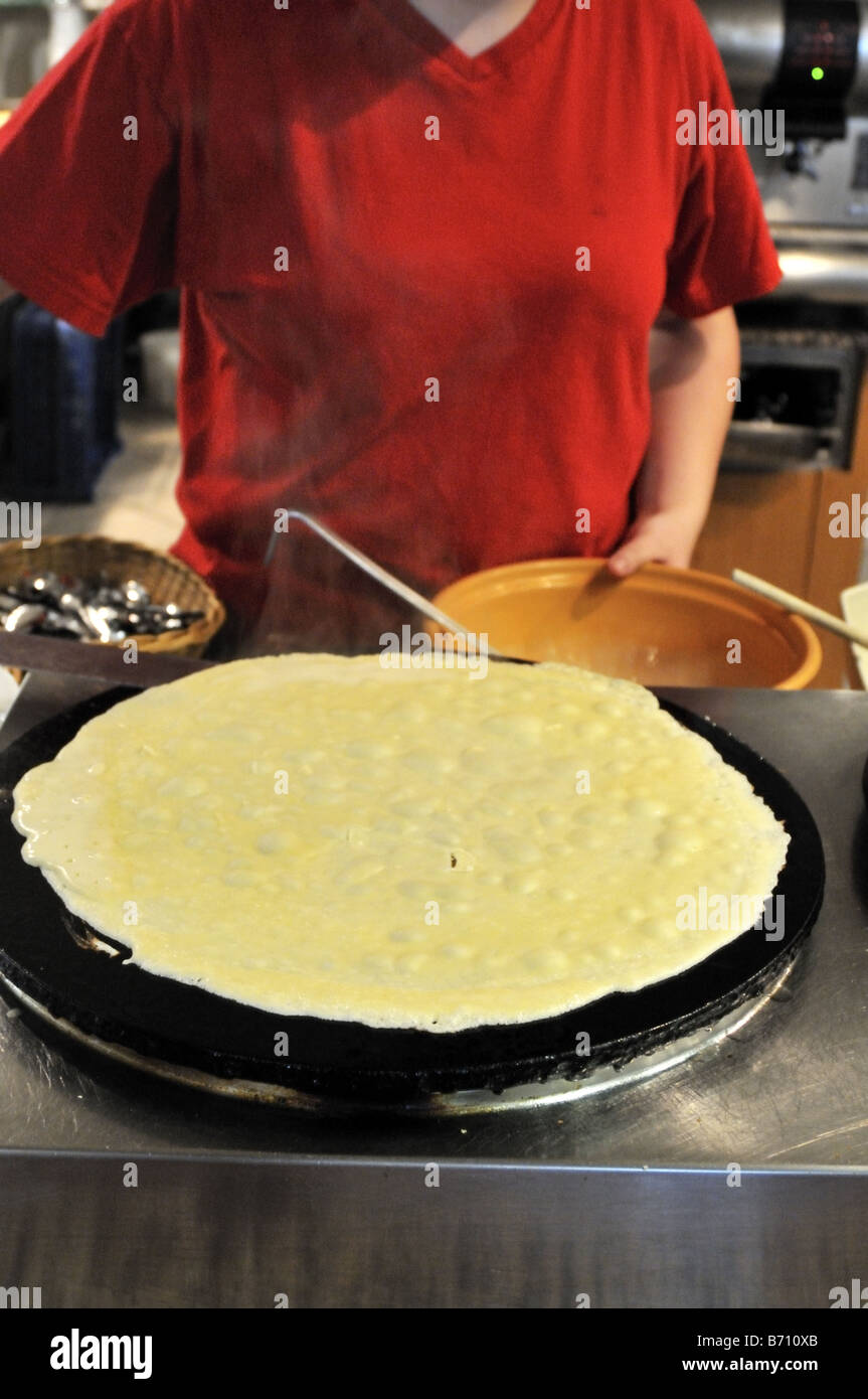 French crepe making sequence 2 of 9 Stock Photo - Alamy