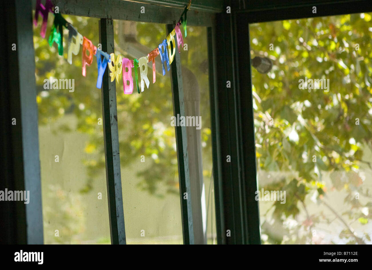 Happy Birthday banner hanging at birthday party Stock Photo - Alamy