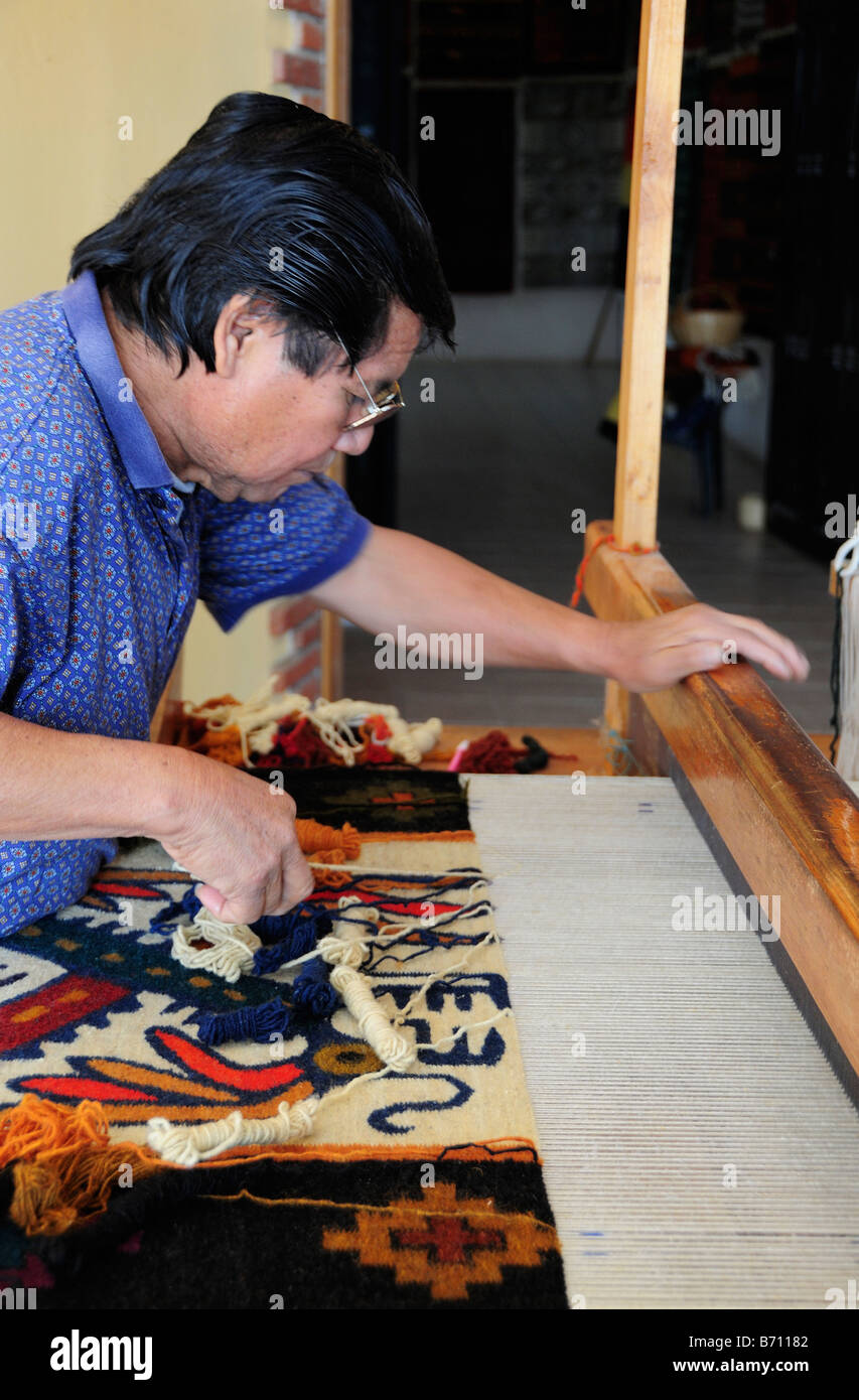Weaver working on loom hi-res stock photography and images - Alamy
