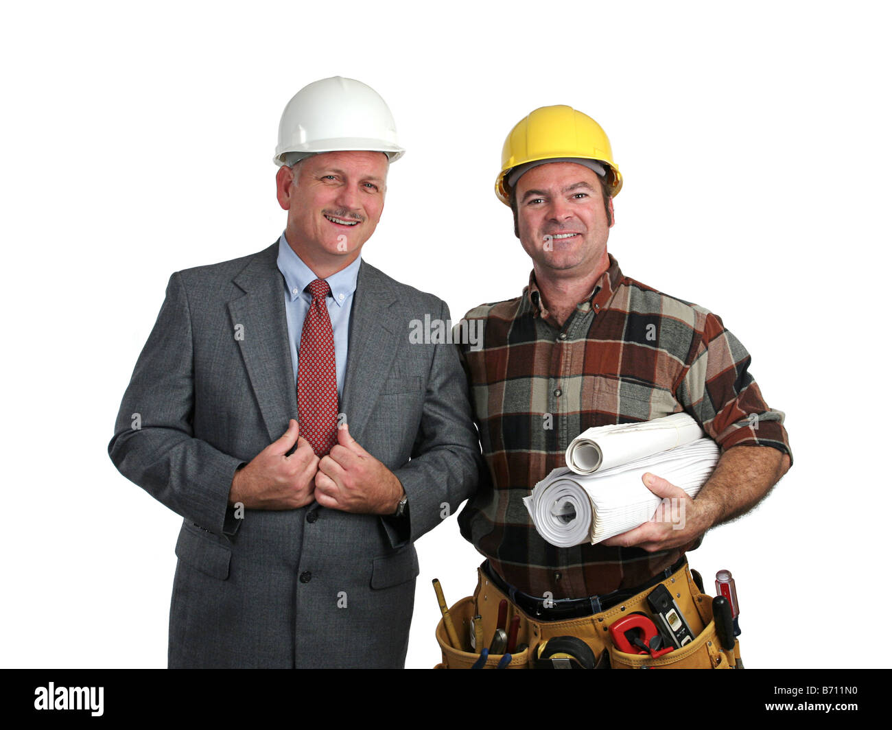 an engineer and a contractor posing together with blueprints Stock ...