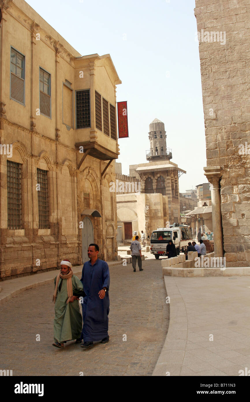 Egyptian people walk in old Cairo street Stock Photo - Alamy