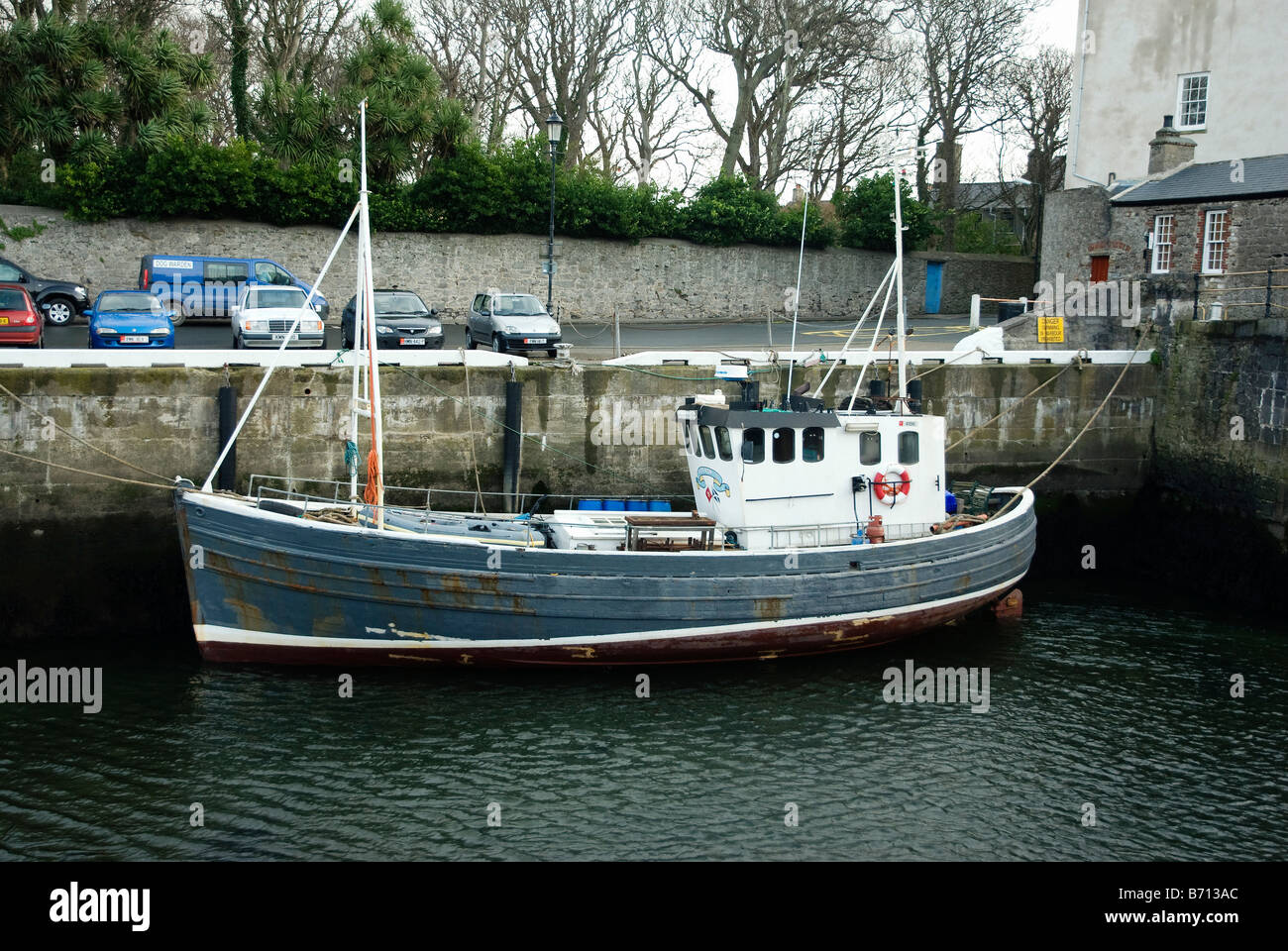 Traditional small wooden fishing boat - Boy Ken Stock Photo - Alamy