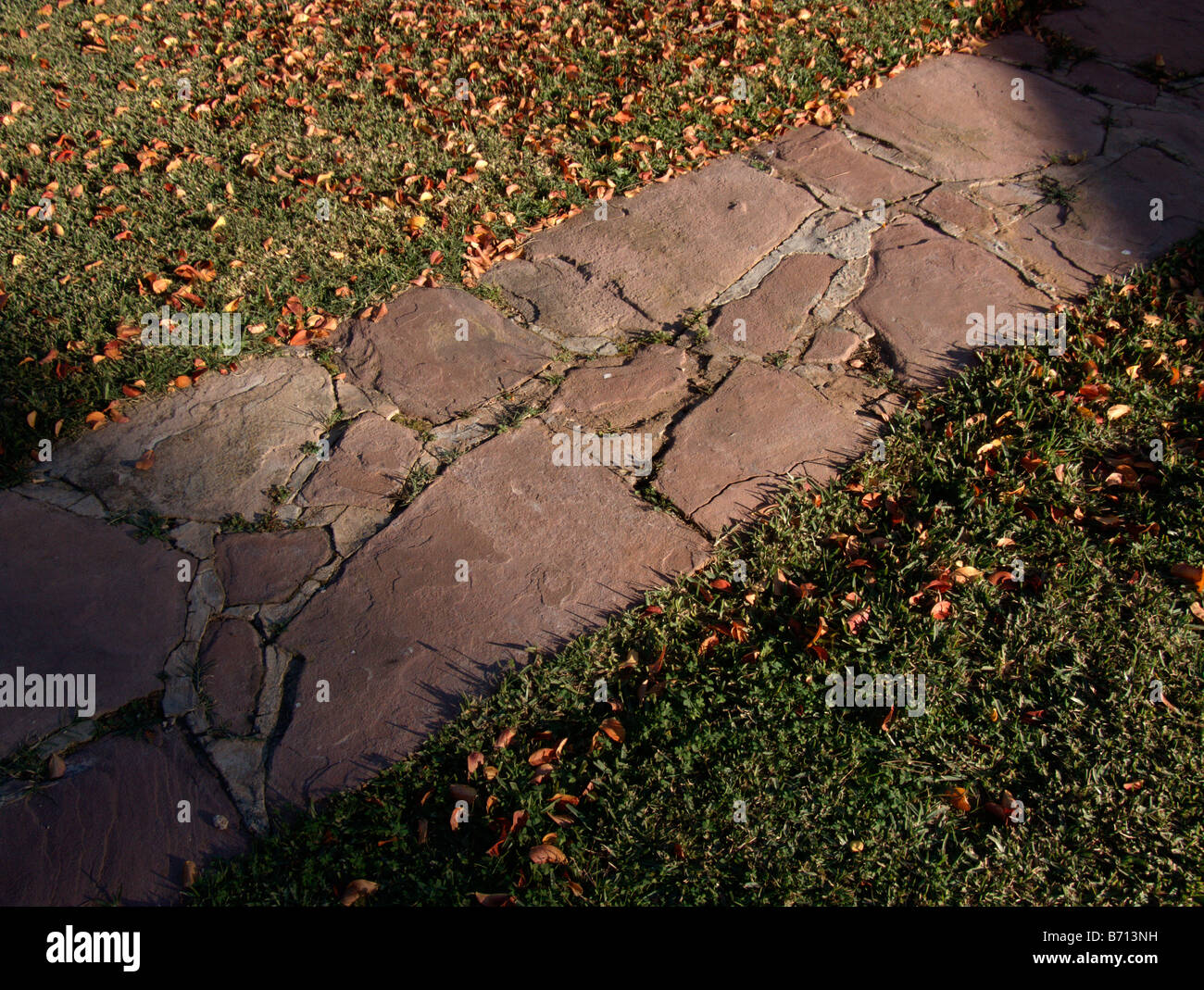 Stone walkway in a garden Stock Photo - Alamy