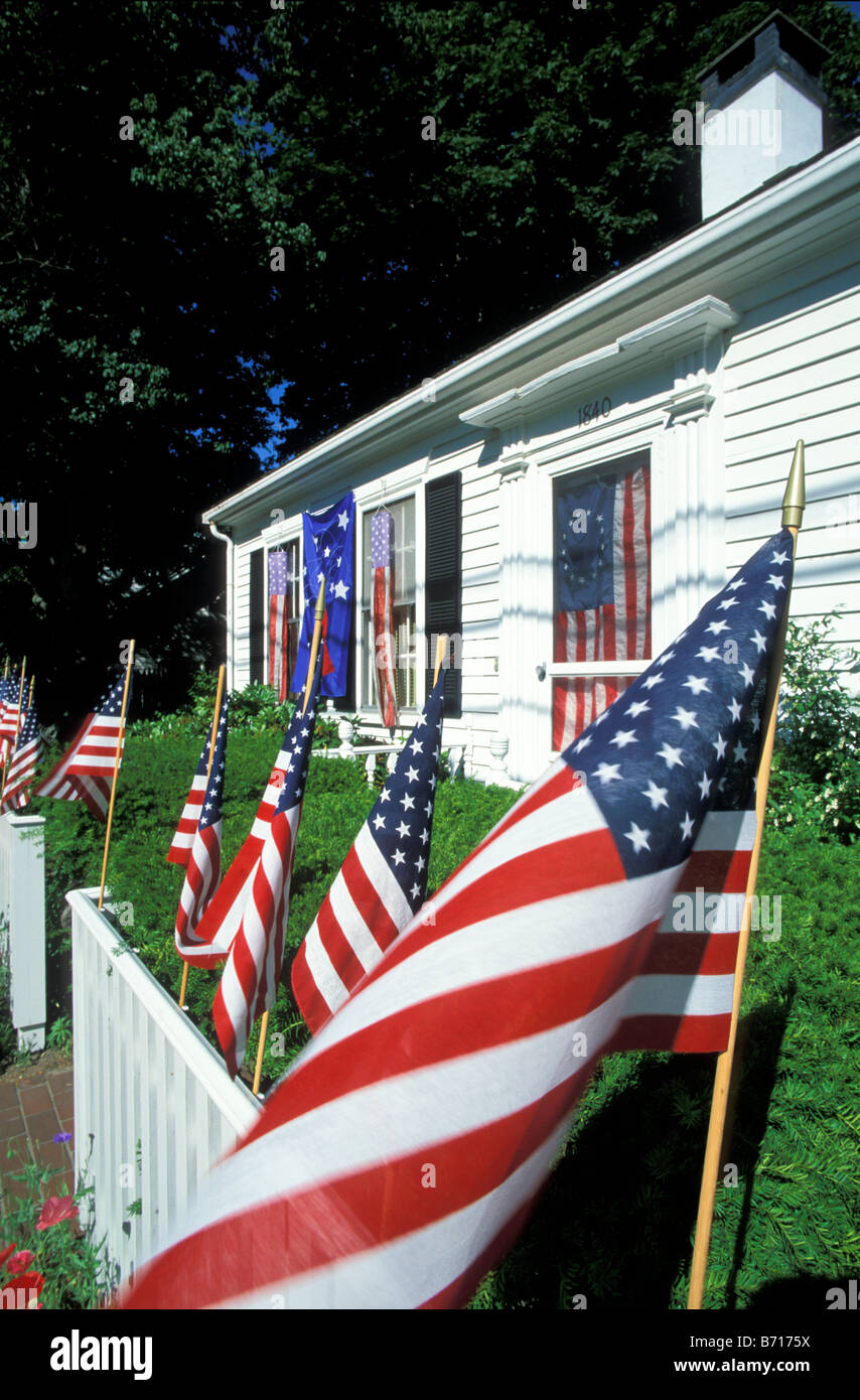 American flags in front of a white house Stock Photo - Alamy