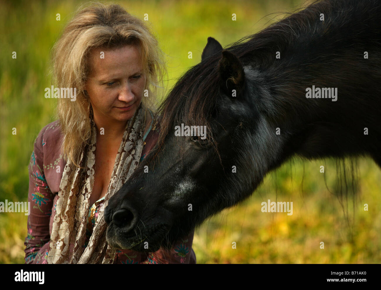 Lady Alice Douglas with black pony Snowdonia North Wales Stock Photo ...