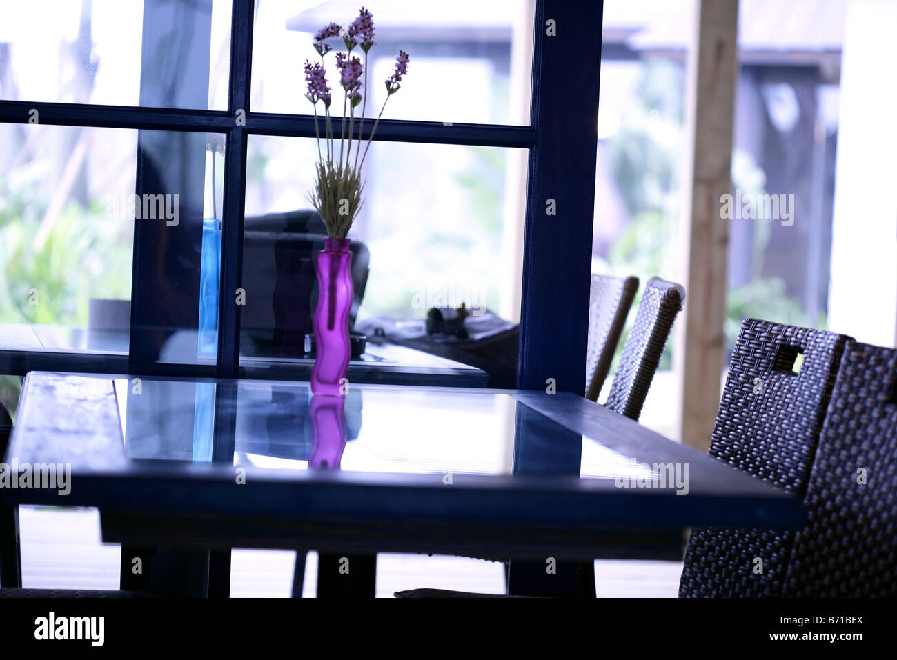 Table Chair Flower Vase Window Stock Photo - Alamy