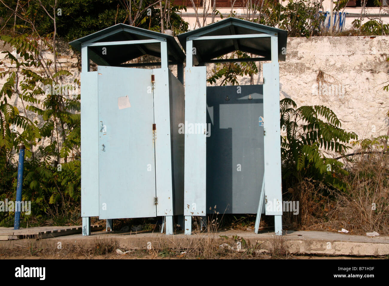 Dilapidated changing huts at Glyfada beach, Corfu Stock Photo - Alamy