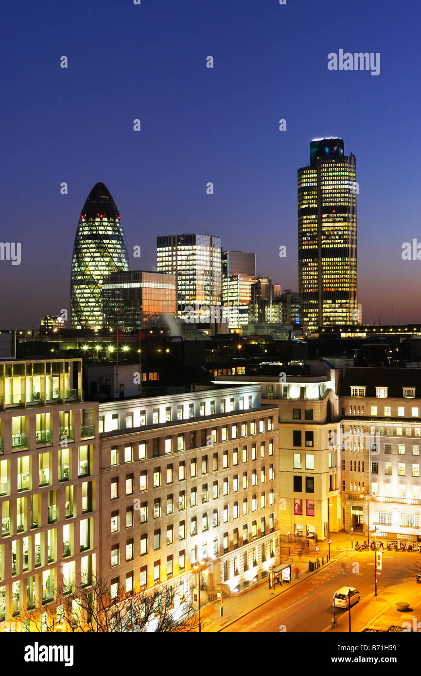 Night shot of Nat West Tower Gherkin and London skyline London England ...