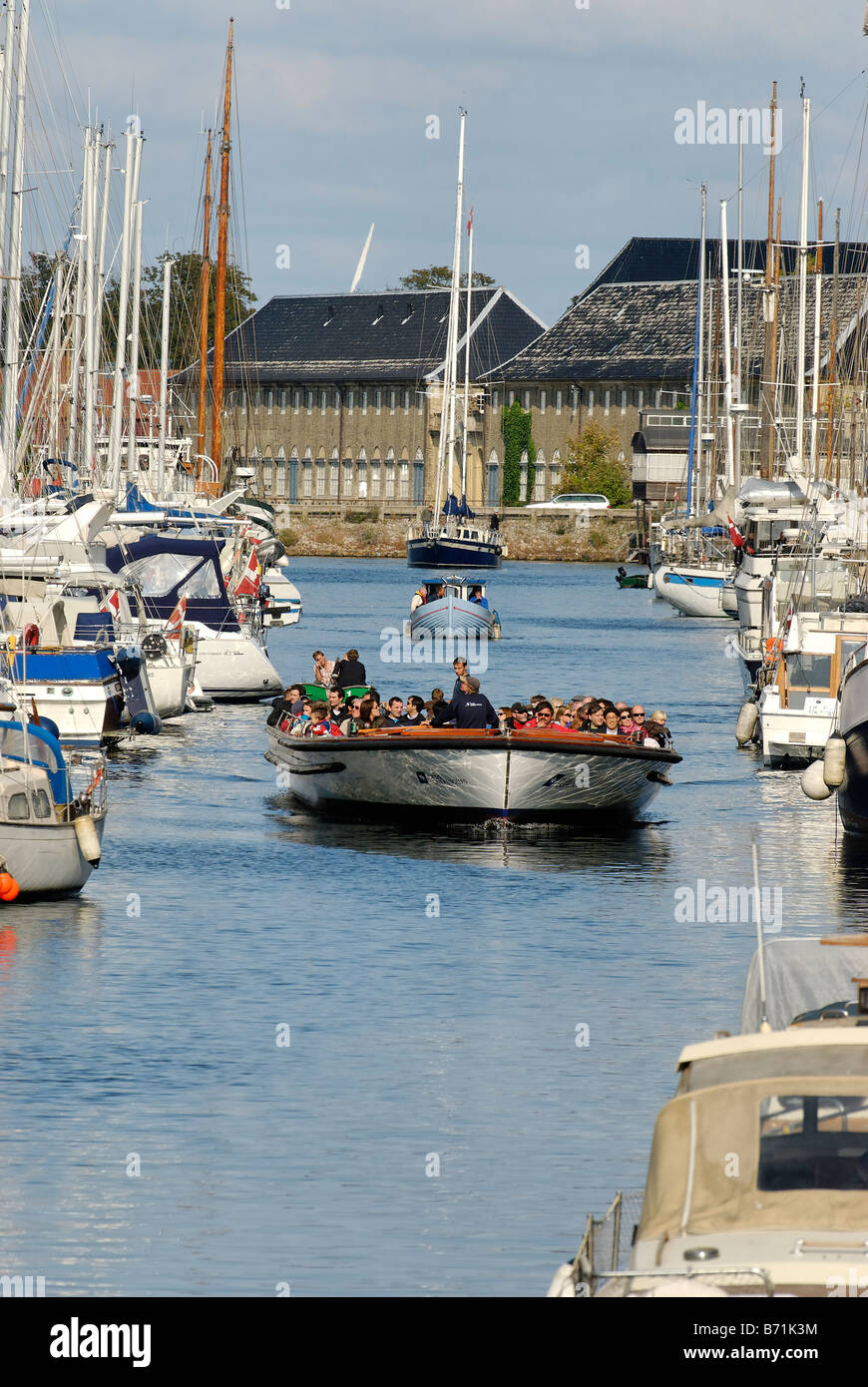 Tourist boat and yachts moors at Christianshavns Channel Copenhagen ...