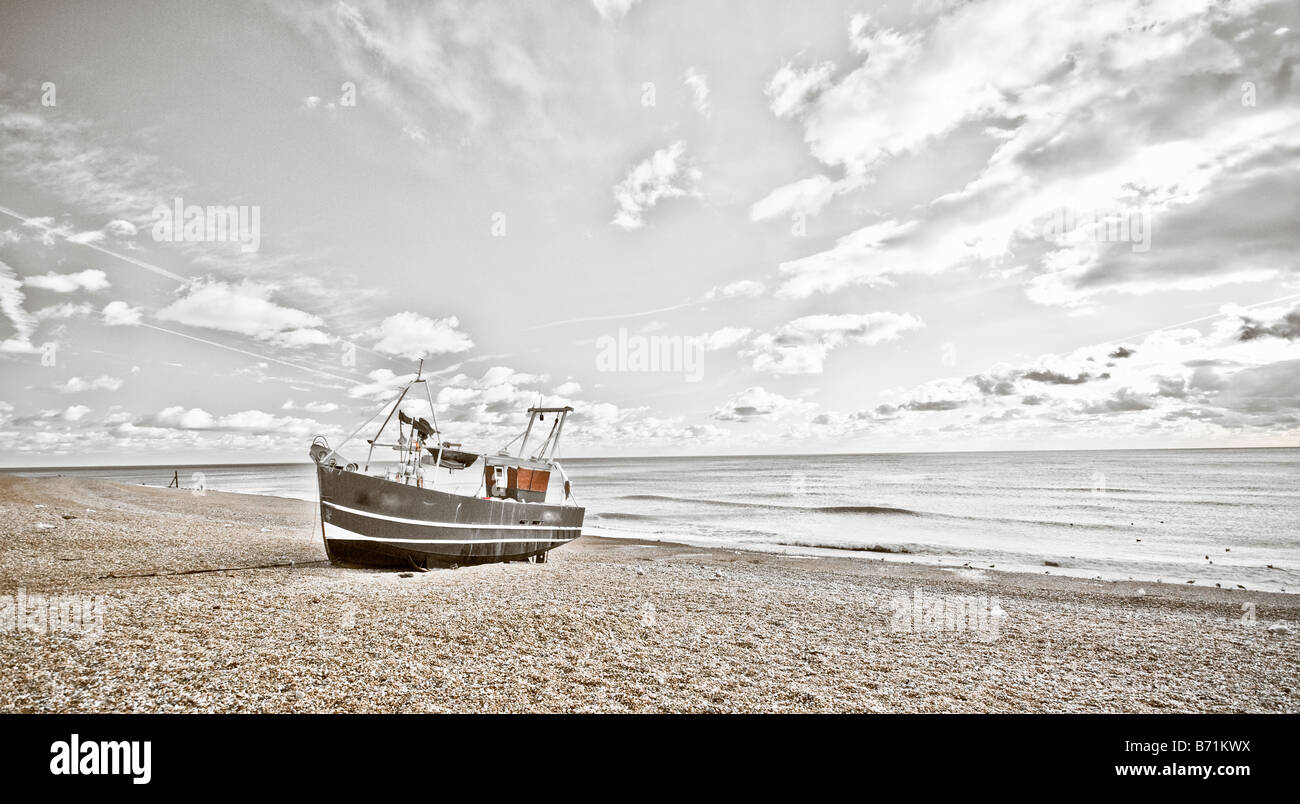 beached fishing boat Stock Photo - Alamy