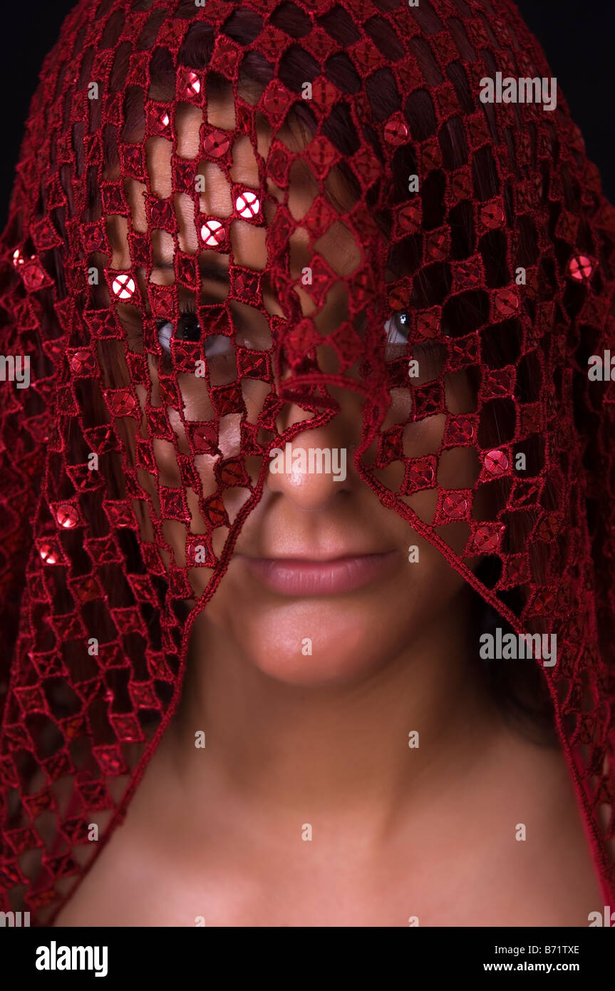 Woman with scarf covering eyes Stock Photo - Alamy