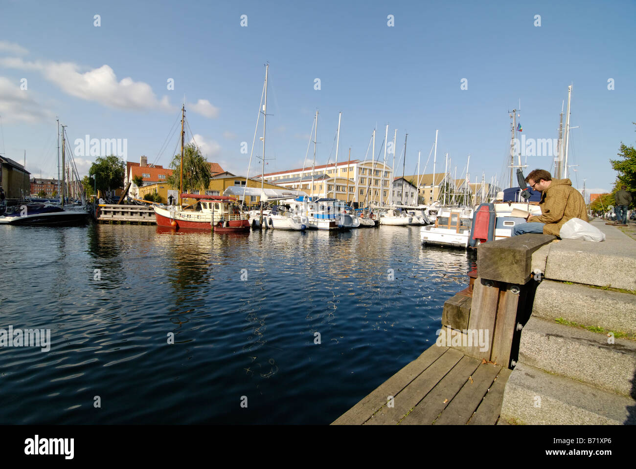 Boats moors at Christianshavns Channel Copenhagen Denmark Stock Photo ...