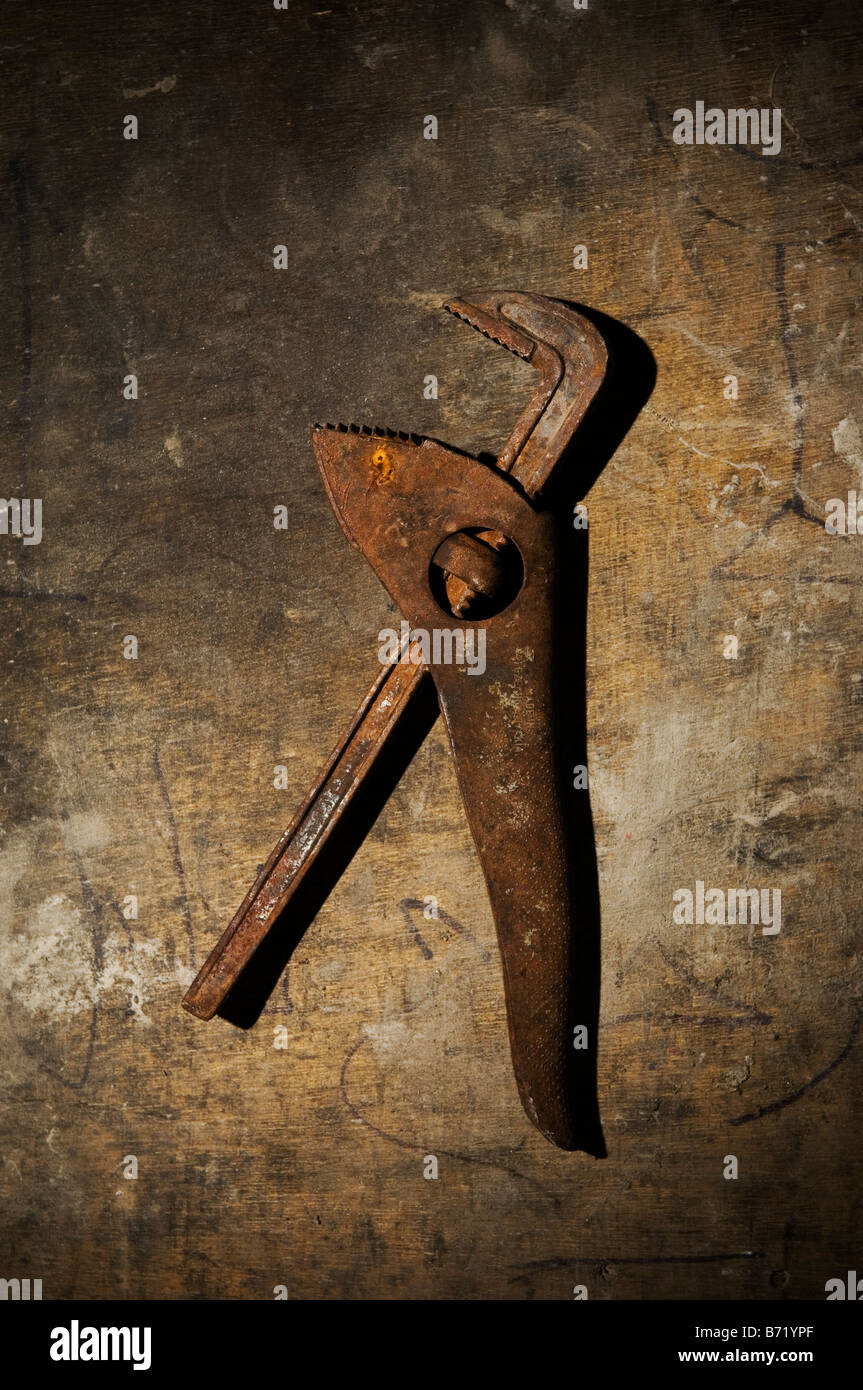 Old fashioned plumber wrench Stock Photo - Alamy
