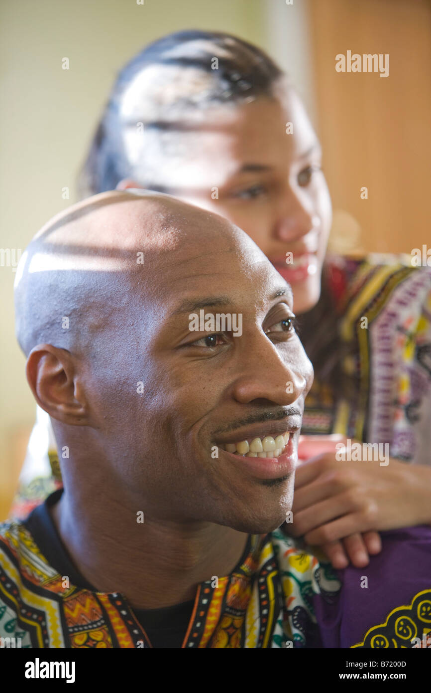 Happy African American father and daughter dressed in traditional ...