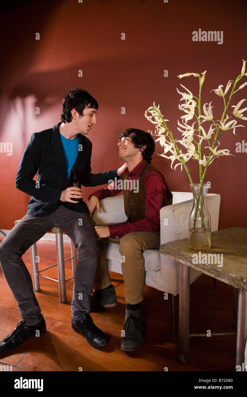 Two young men having a discussion and hanging out together Stock Photo ...