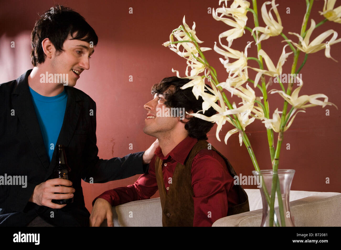 Two young men having a discussion and hanging out together Stock Photo ...