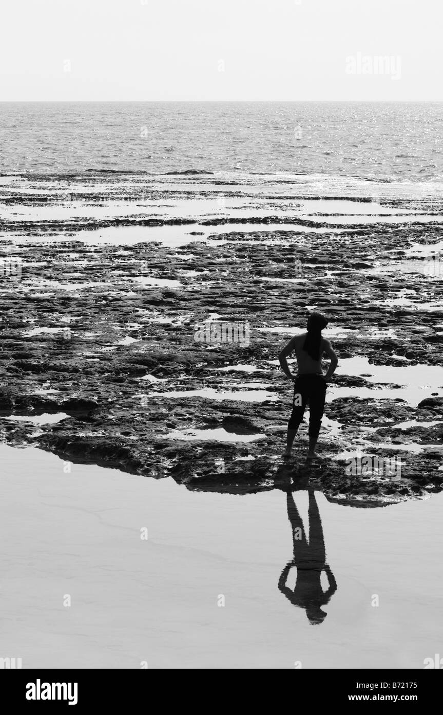 Single man on beach full figure hi-res stock photography and images - Alamy