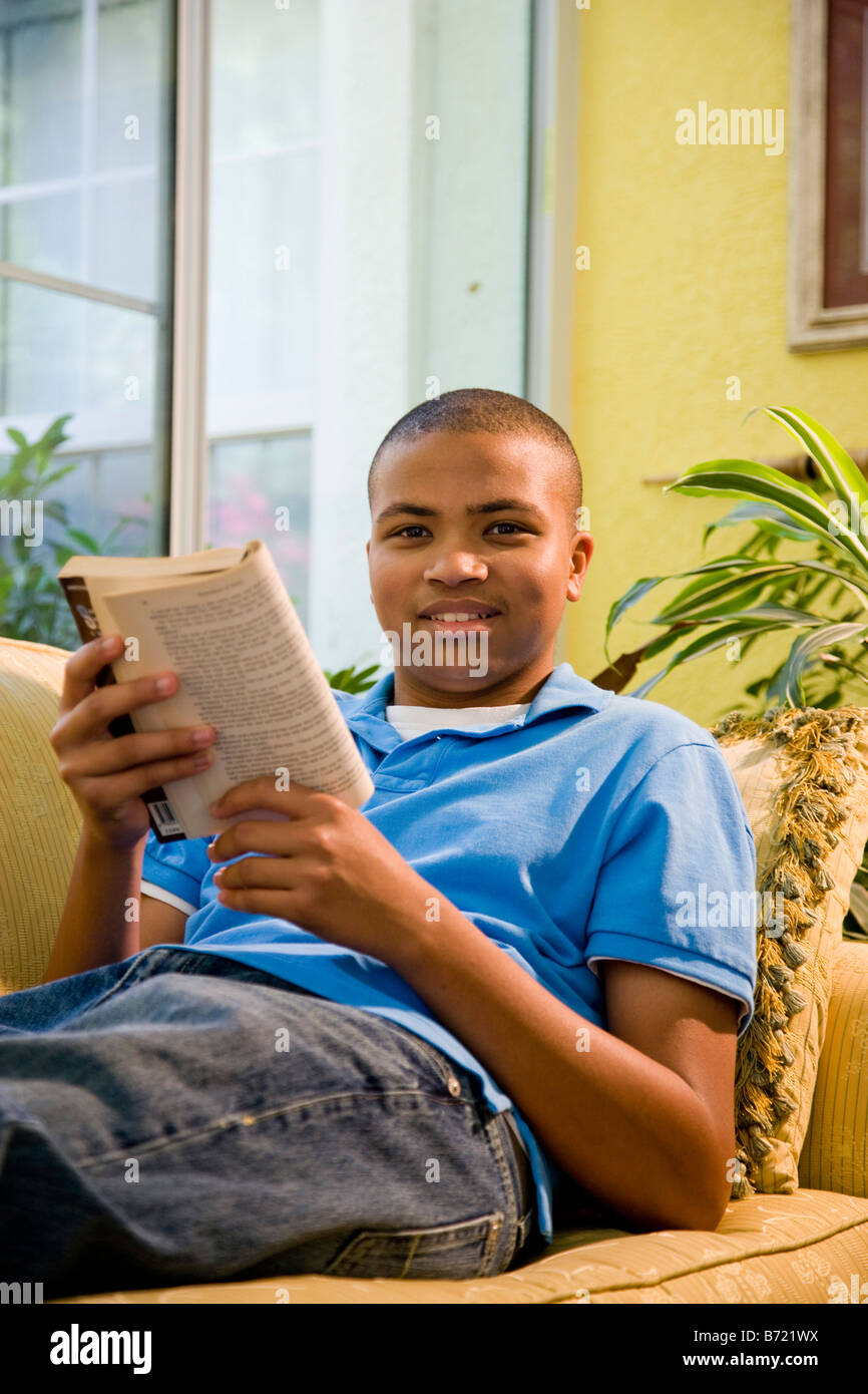 Teen Boy Reading A Book