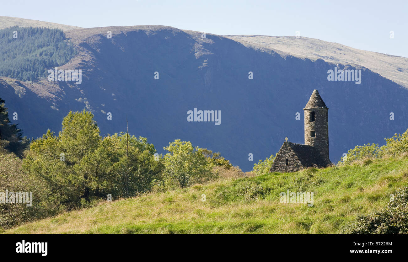 St Kevin's Chapel. The round tower sets this small stone chapel apart ...