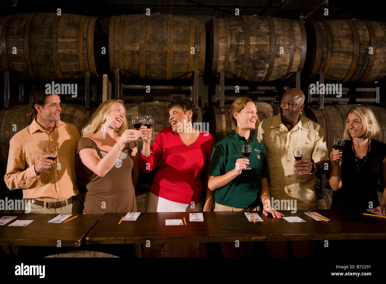 Group of people at a winery tour and tasting Stock Photo - Alamy