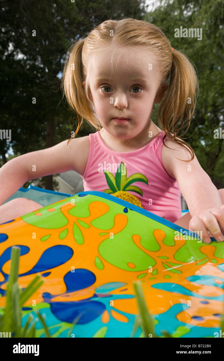 Half girl with down syndrome hi-res stock photography and images - Alamy