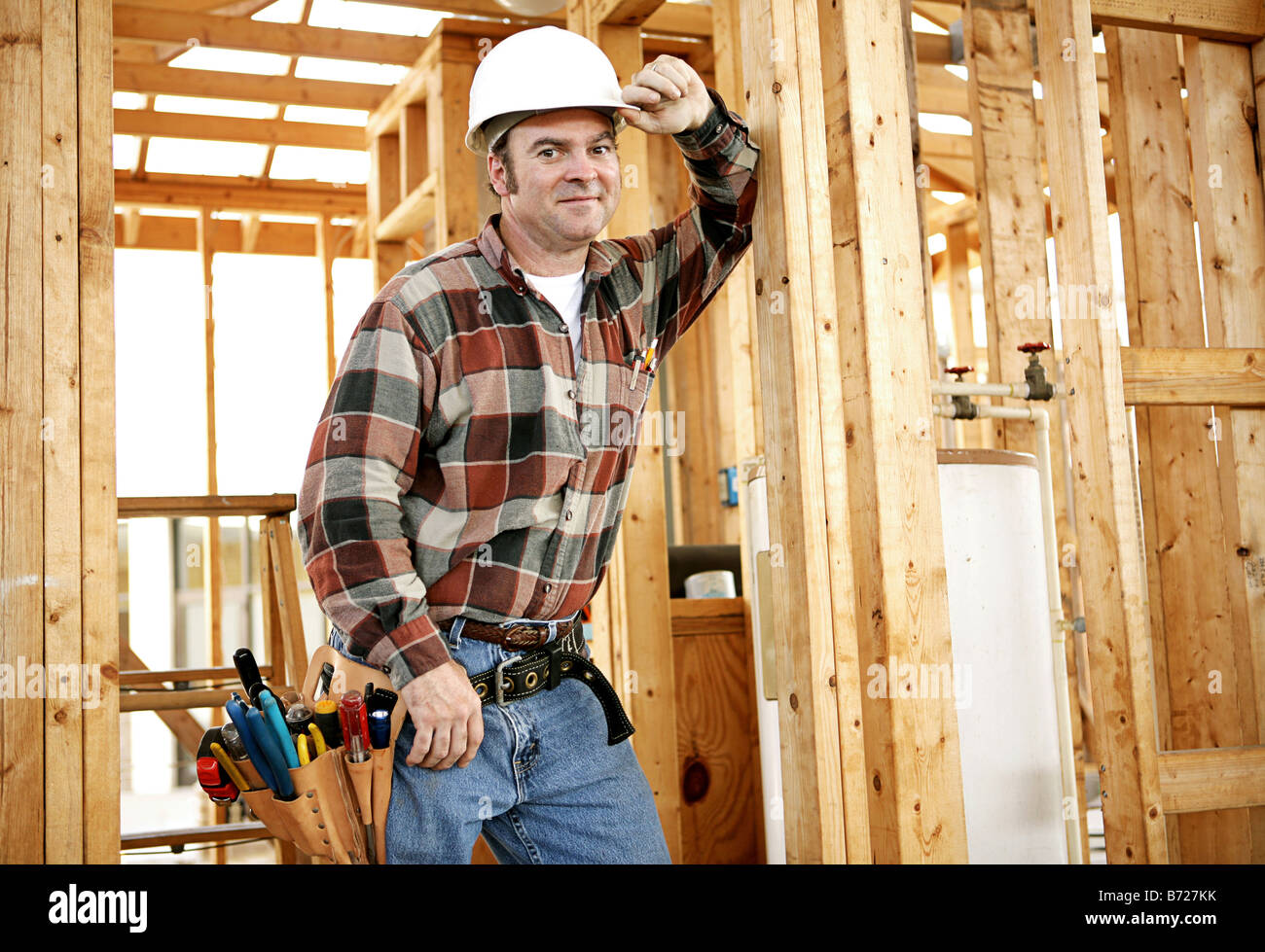 A construction worker with his tools on the jobsite Authentic ...