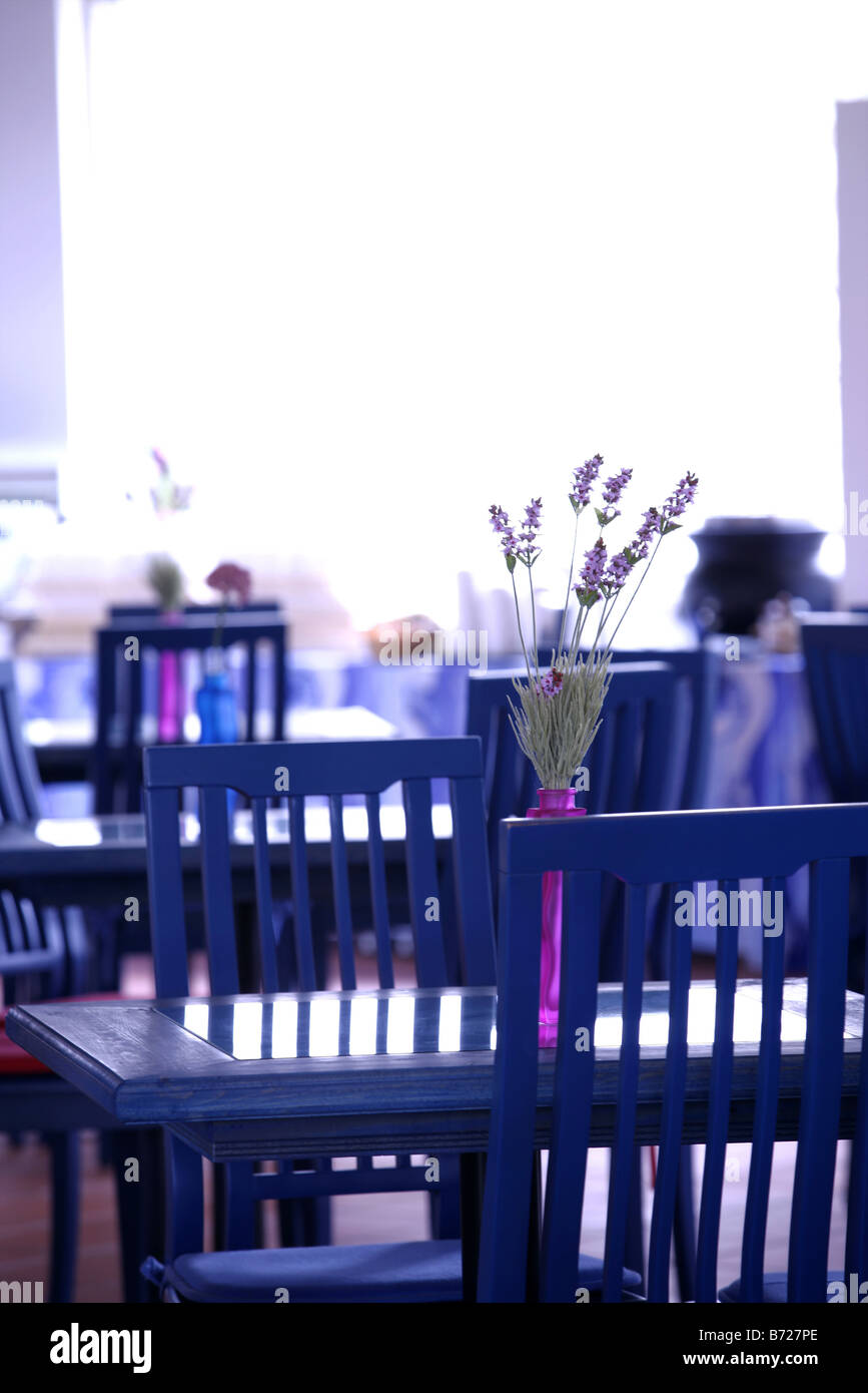 Table Chair Flower Window Stock Photo - Alamy