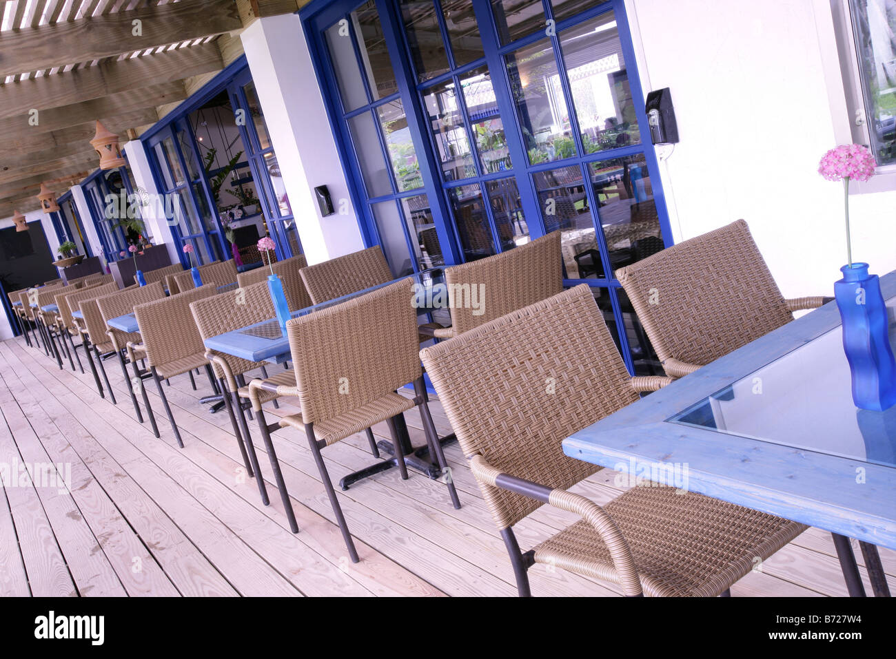 Table Chair Flower Vase Window Stock Photo - Alamy