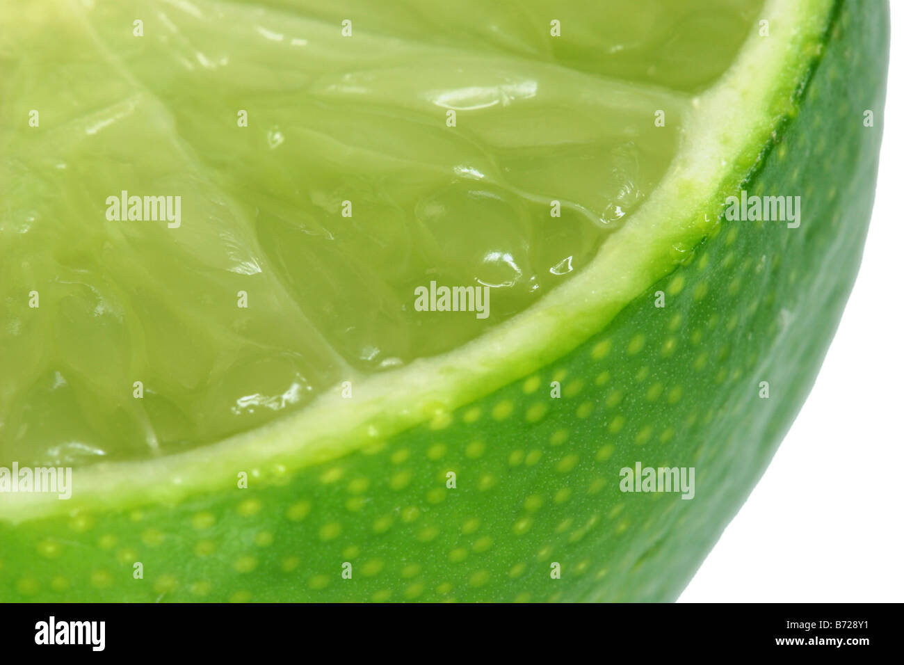 Sliced Lime on white background Stock Photo - Alamy