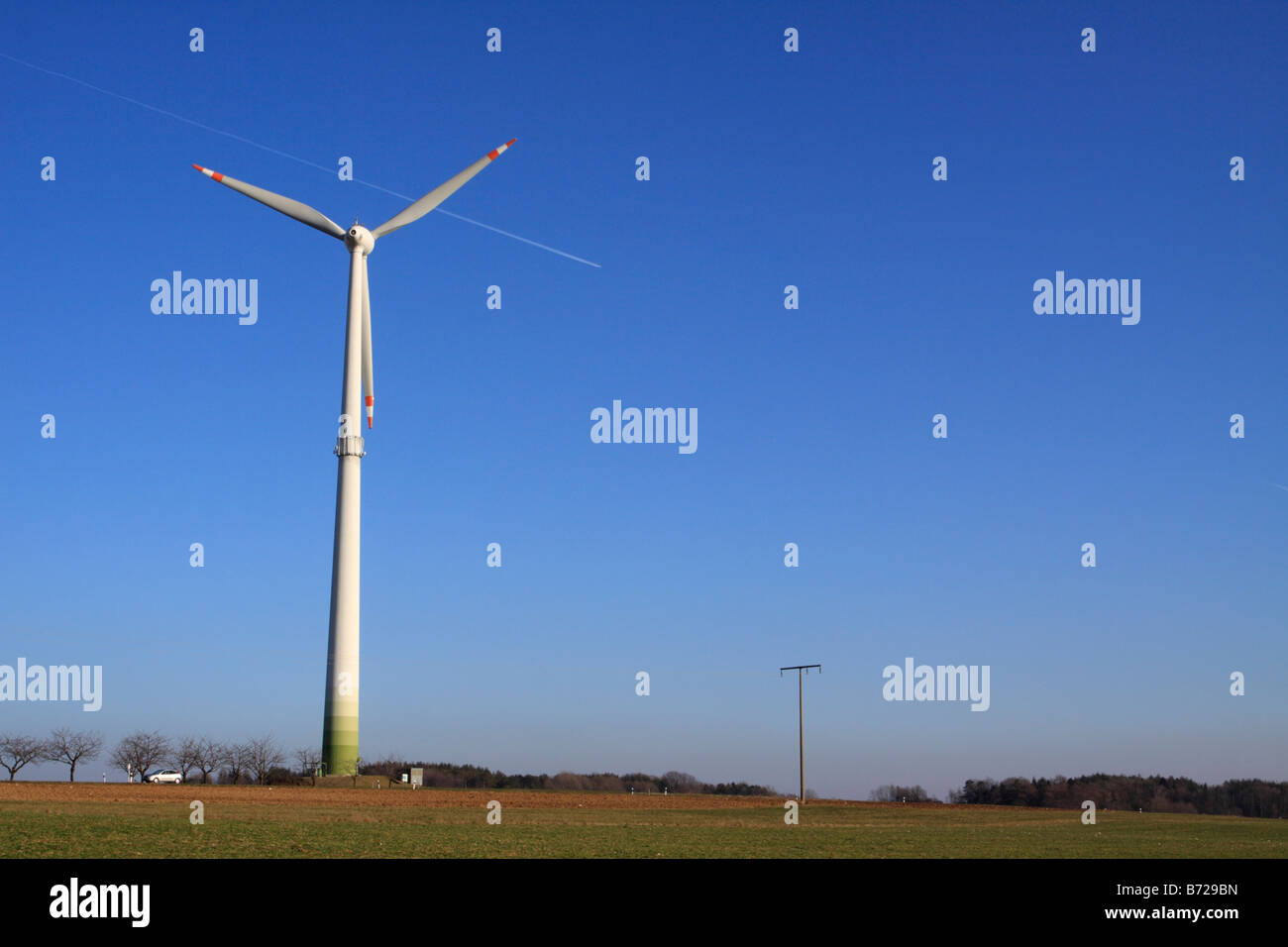 Wind turbine and power lines Stock Photo - Alamy